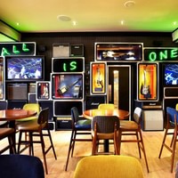 Combine a visit to Tivoli with a meal at the Hard Rock Cafe in ...